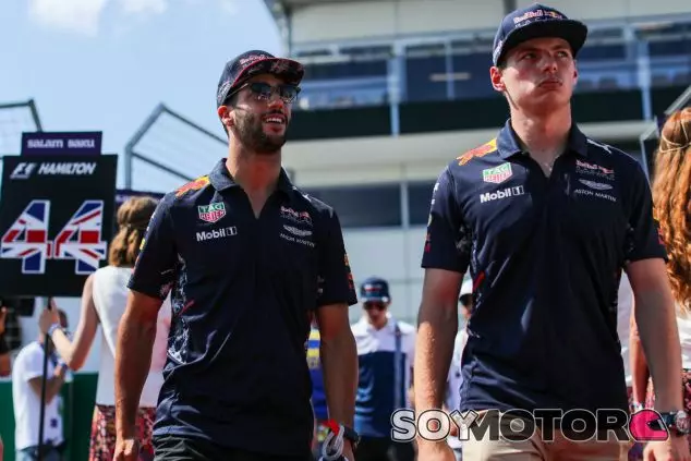 Daniel Ricciardo and Max Verstappen during a GP this season