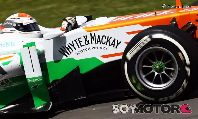 Adrian Sutil s pneumatikami Pirelli na svojom VJM06 - LaF1